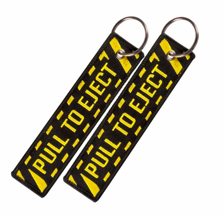 Pull to Eject Keychain – Fix Fly Travel